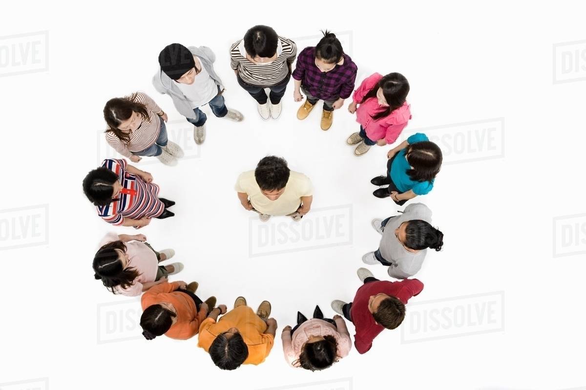 Man in circle of people - Royalty-free Stock Photo | Dissolve