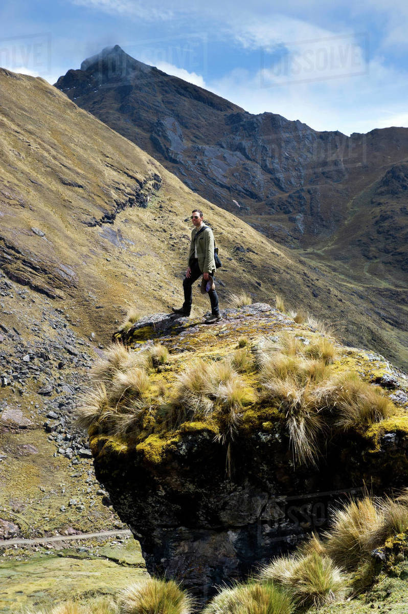 Man looking at view to Qelqanqa, Peru - Royalty-free Stock Photo | Dissolve