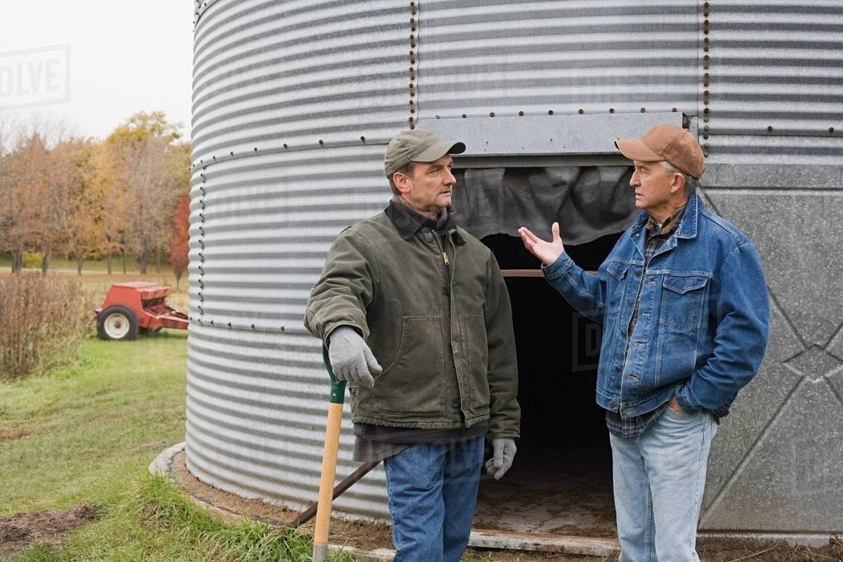 Farmers talking - Royalty-free Stock Photo | Dissolve