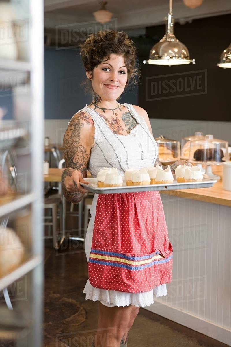 Waitress with a tray - Stock Photo - Dissolve