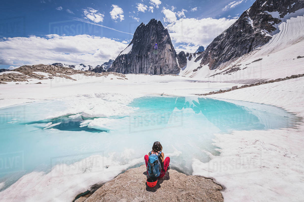 Climber looking at the view, Bugaboo Provincial Park, British Columbia ...
