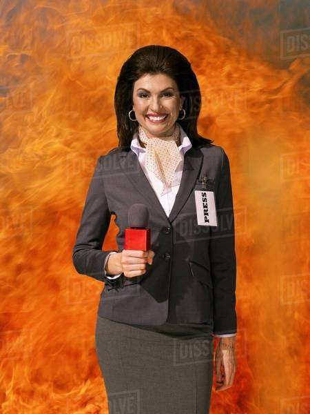 News presenter and fire - Royalty-free Stock Photo | Dissolve
