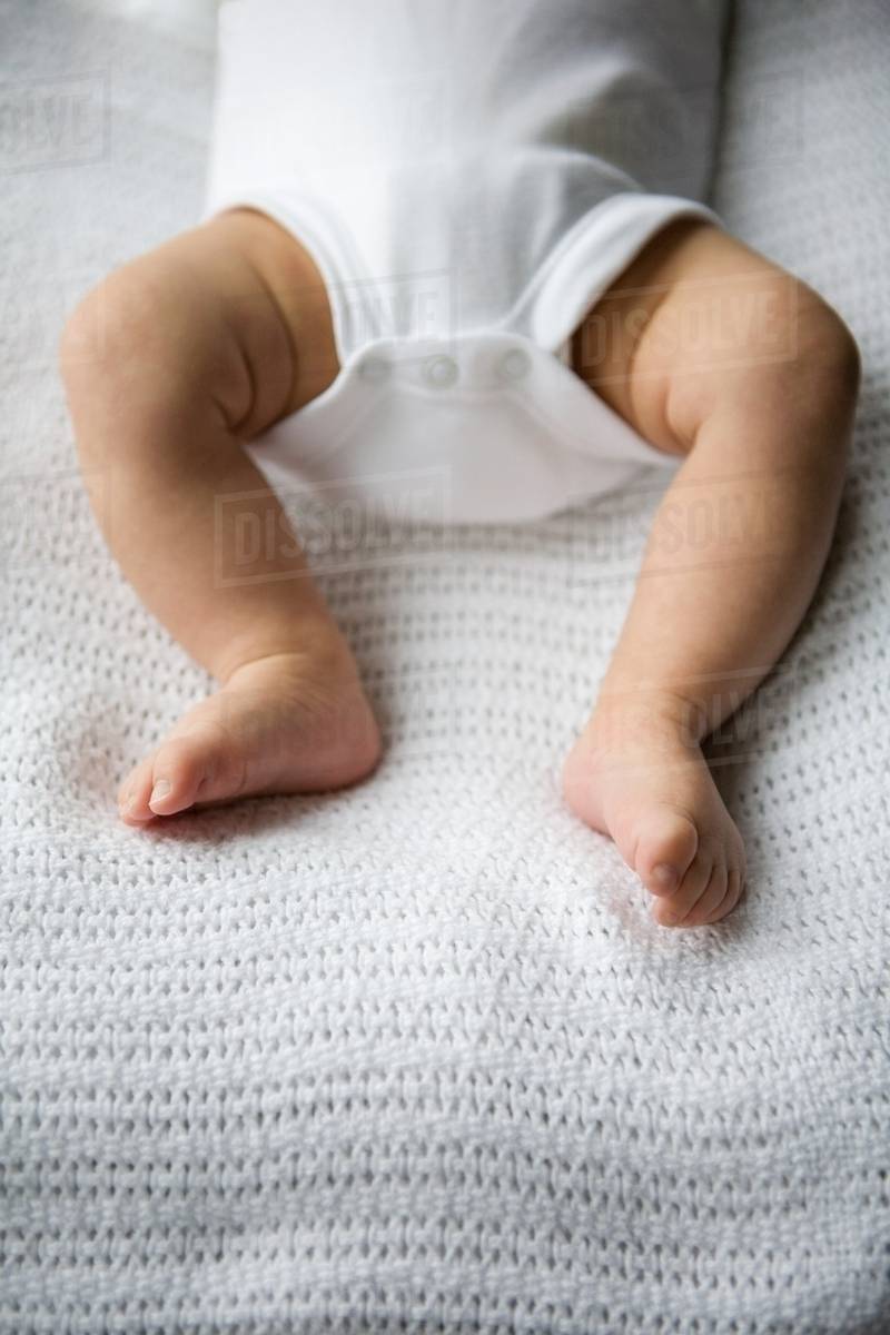 Baby legs - Stock Photo - Dissolve