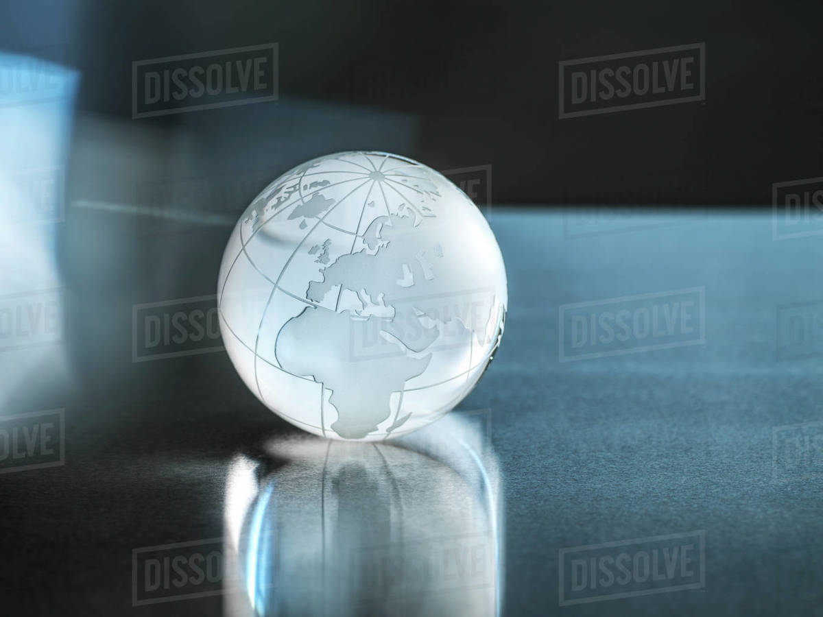 Glass globe of the world - Stock Photo - Dissolve
