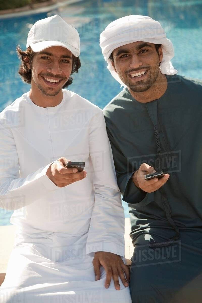 Two Middle Eastern men with mobile phones - Royalty-free Stock Photo ...