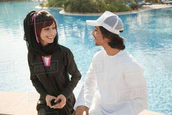 Middle Eastern people by swimming pool - Royalty-free Stock Photo ...