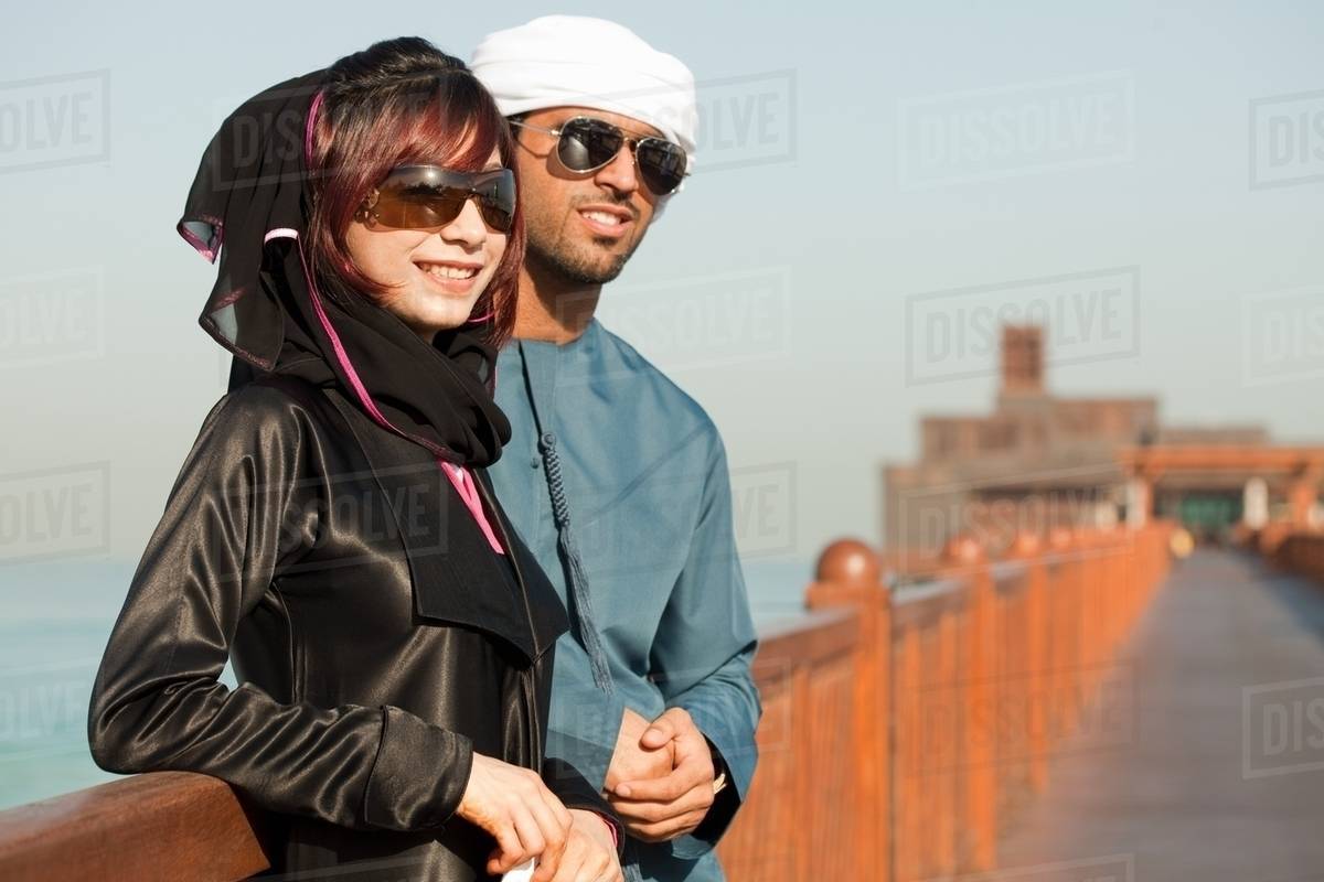 Middle Eastern people and fence, outdoors - Royalty-free Stock Photo ...
