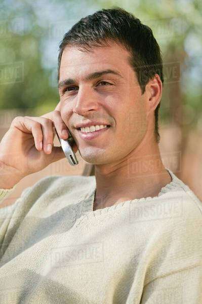 Close up of man using cellphone - Royalty-free Stock Photo | Dissolve