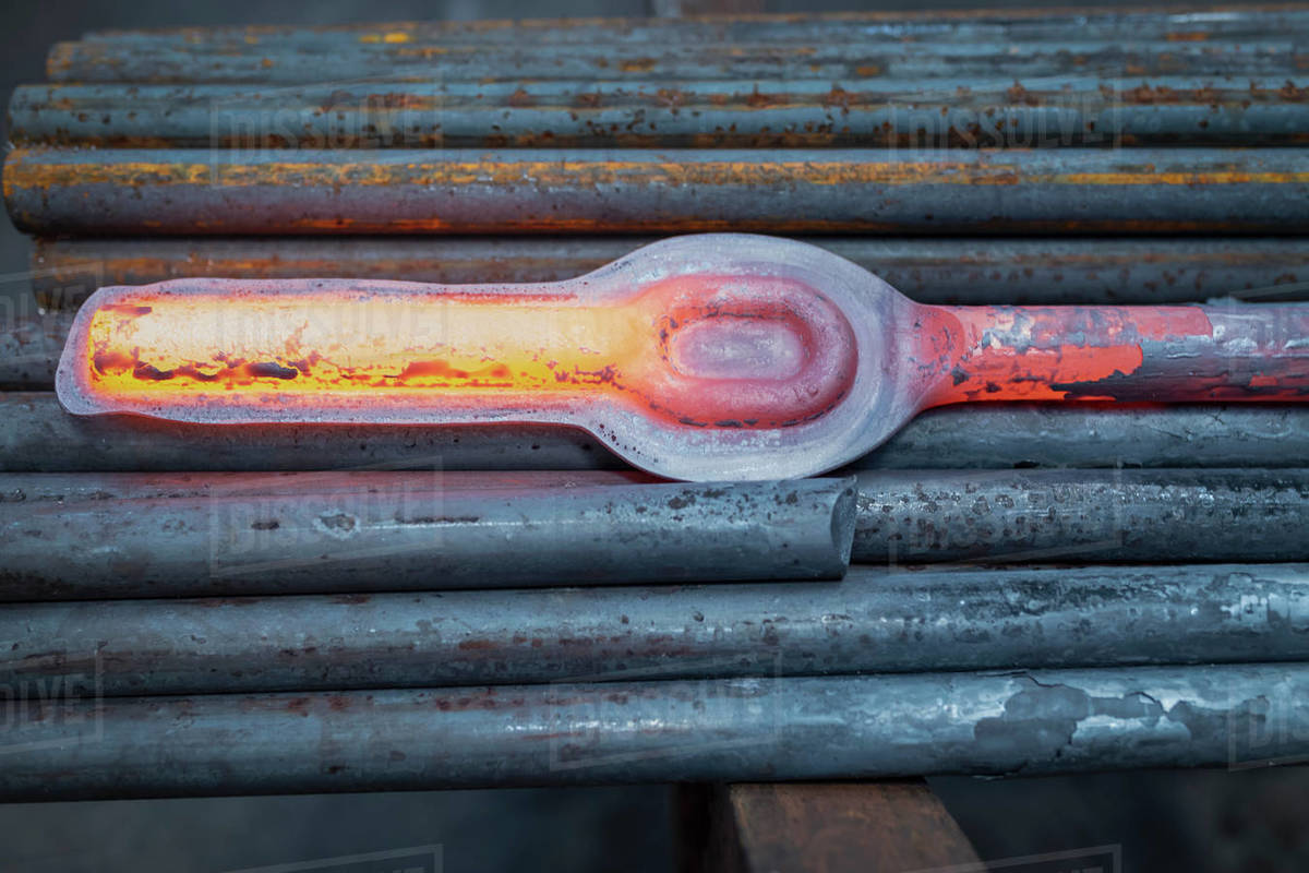 Hot forged steel part in industrial forge - Royalty-free Stock Photo ...