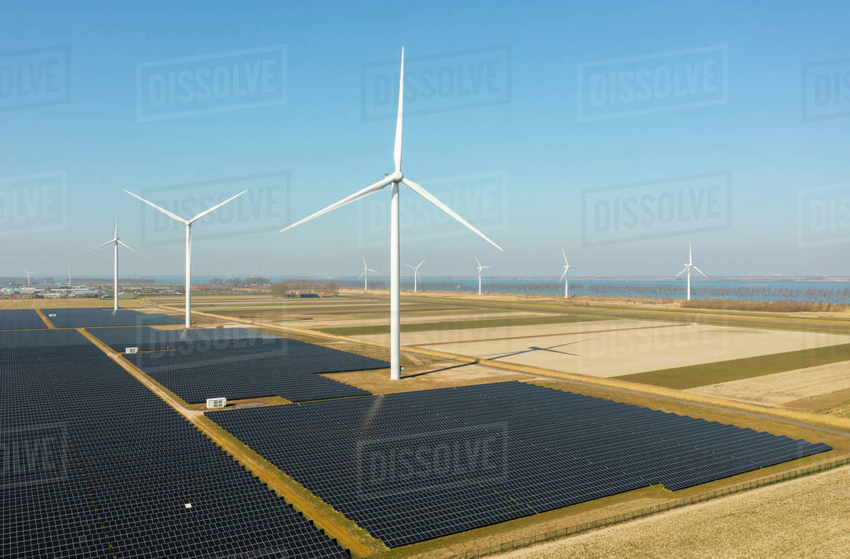 Netherlands, Combined solar and wind farm - Stock Photo - Dissolve