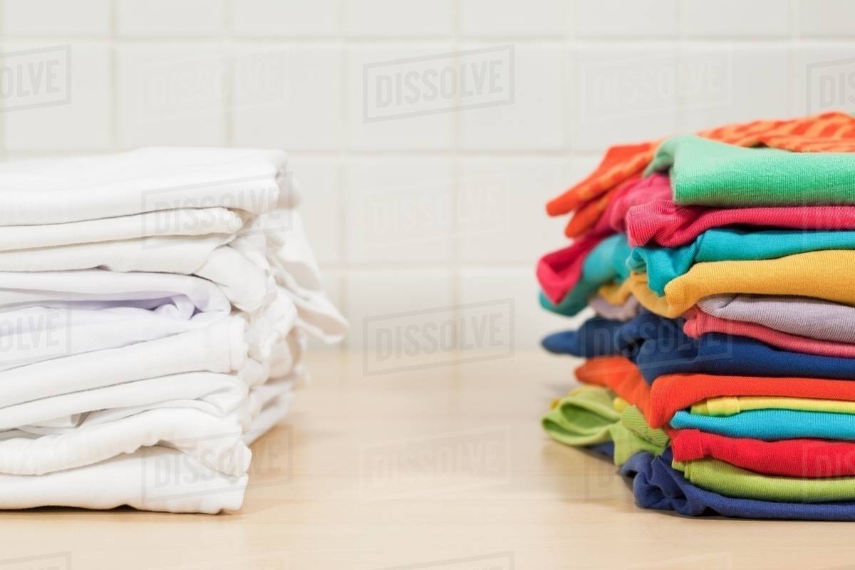 Piles of clean laundry - Royalty-free Stock Photo | Dissolve