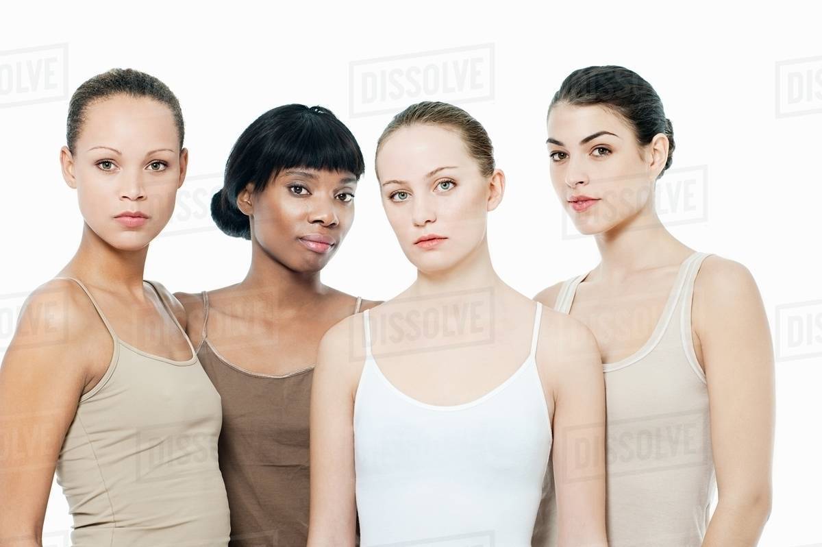 Four young women together - Royalty-free Stock Photo | Dissolve