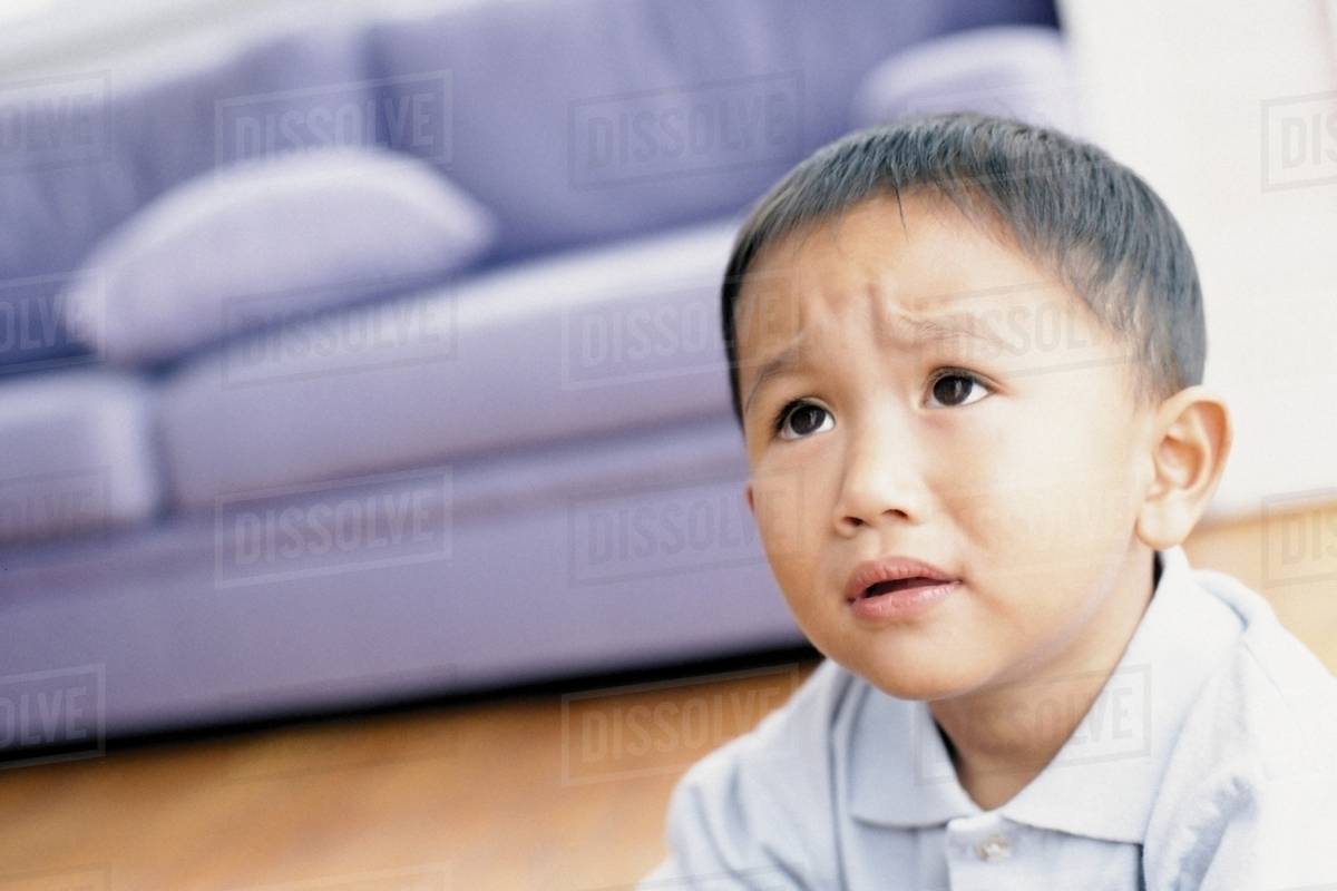 Boy looking confused - Royalty-free Stock Photo | Dissolve