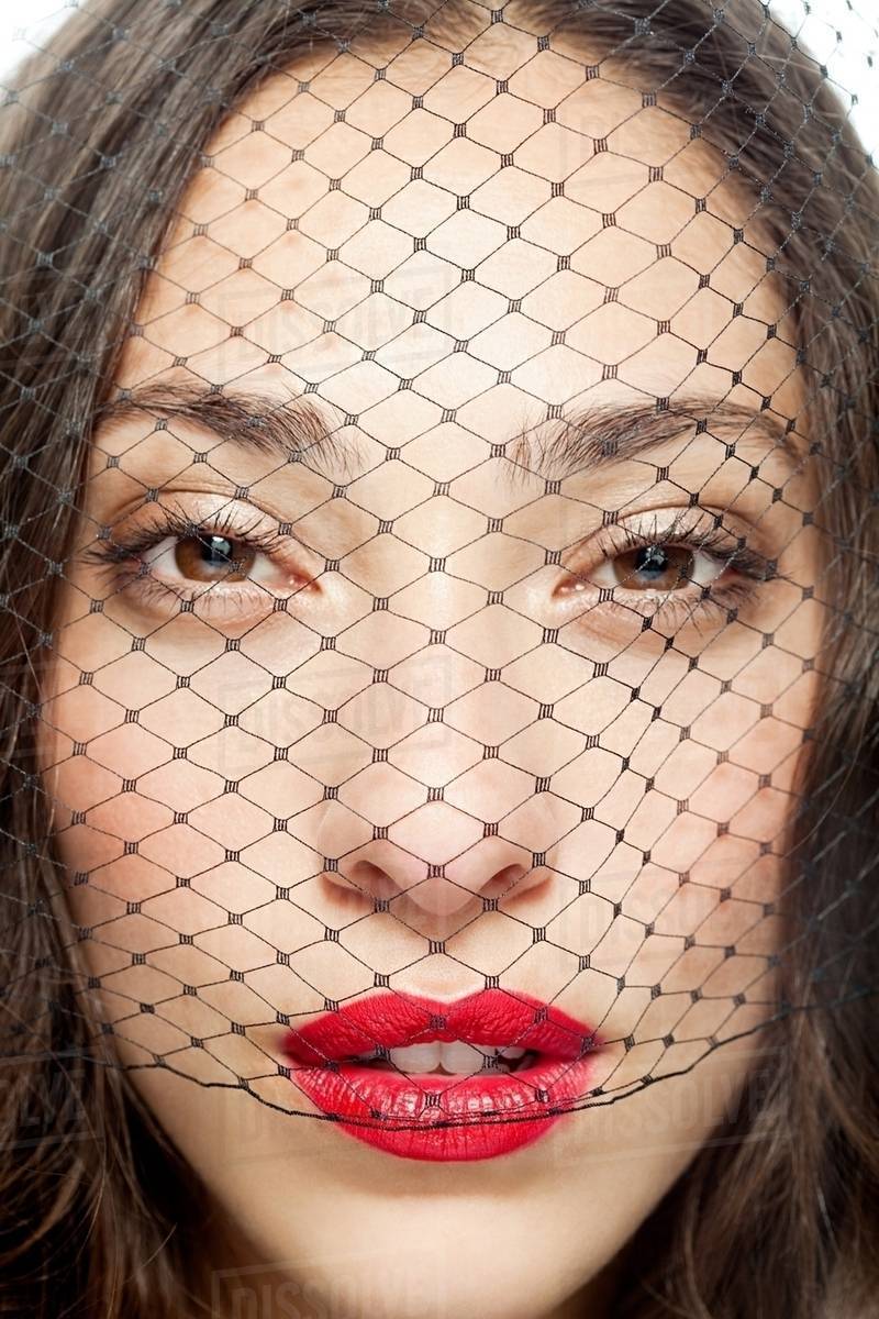 Woman with netting covering face - Royalty-free Stock Photo | Dissolve