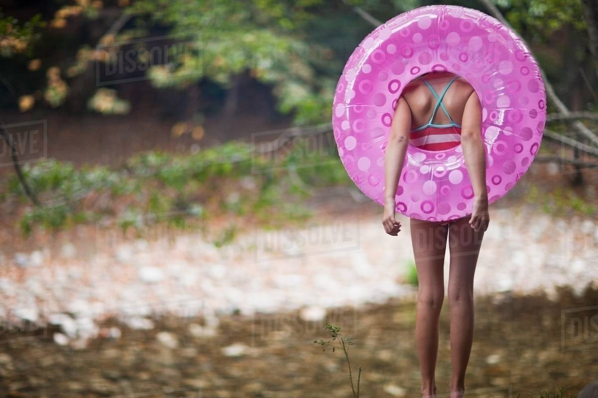 Girl with inflatable ring - Royalty-free Stock Photo | Dissolve