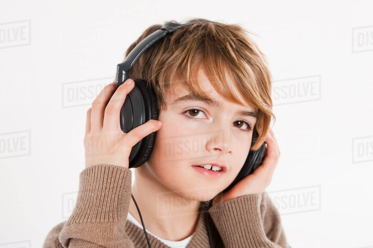 Boy wearing headphones - Royalty-free Stock Photo | Dissolve