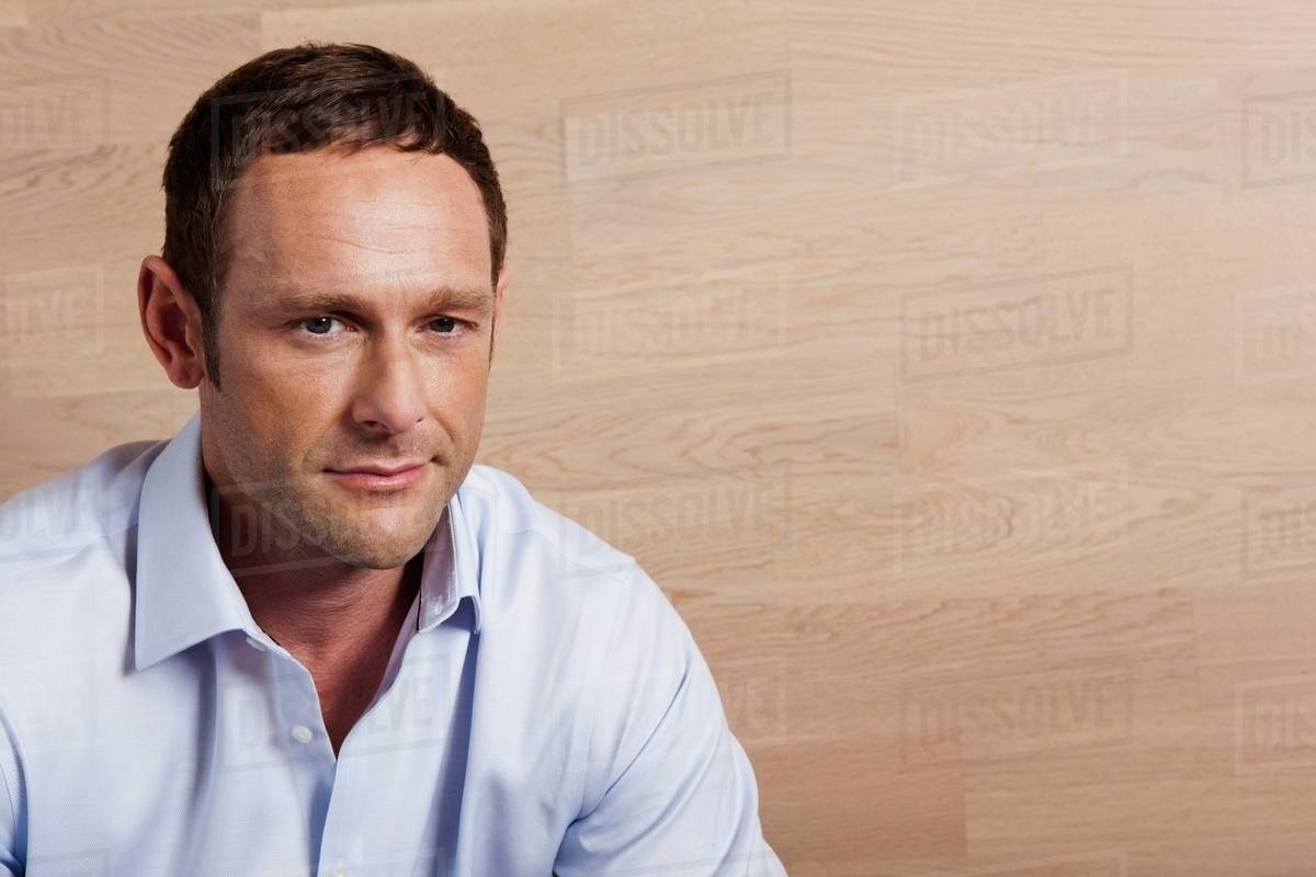 Mid adult man, portrait - Royalty-free Stock Photo | Dissolve