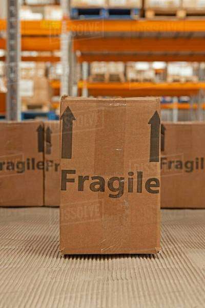 Cardboard box with the word fragile printed on it - Royalty-free Stock ...