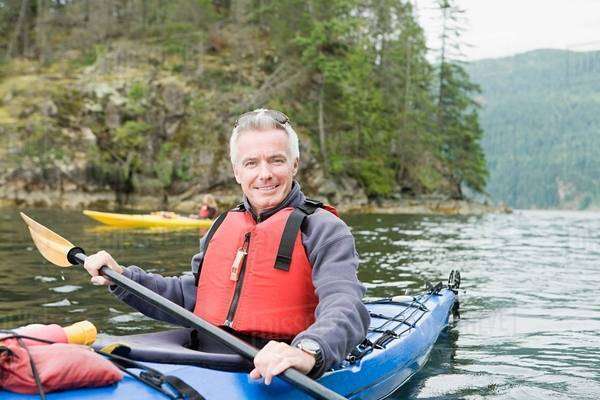 Man kayaking - Stock Photo - Dissolve