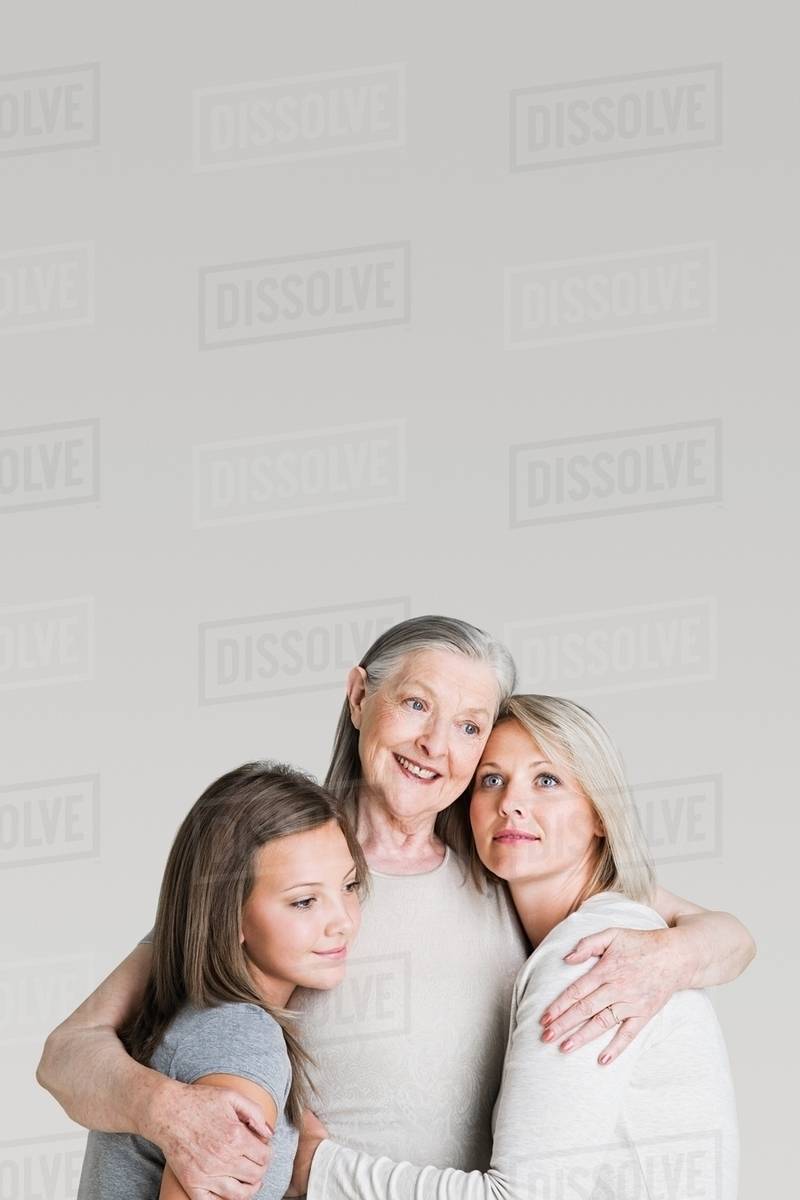 Female family members hugging - Royalty-free Stock Photo | Dissolve