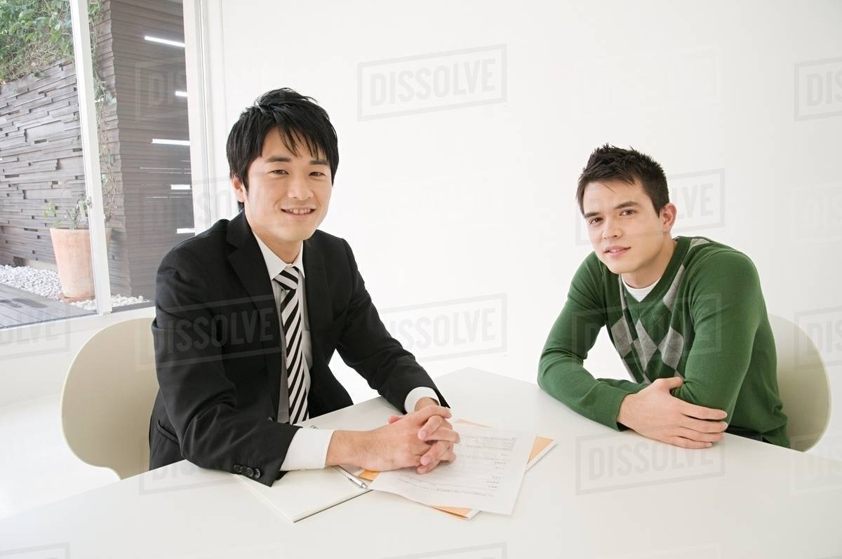 Portrait of a businessman and a client - Royalty-free Stock Photo ...