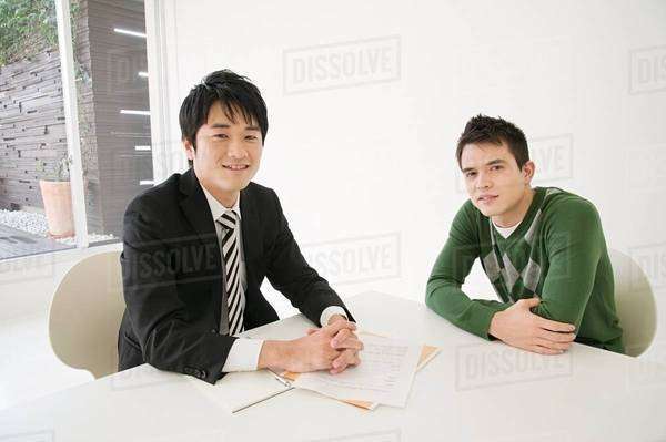 Portrait of a businessman and a client - Royalty-free Stock Photo ...