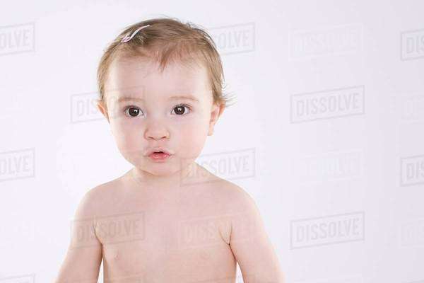 Baby pouting - Stock Photo - Dissolve
