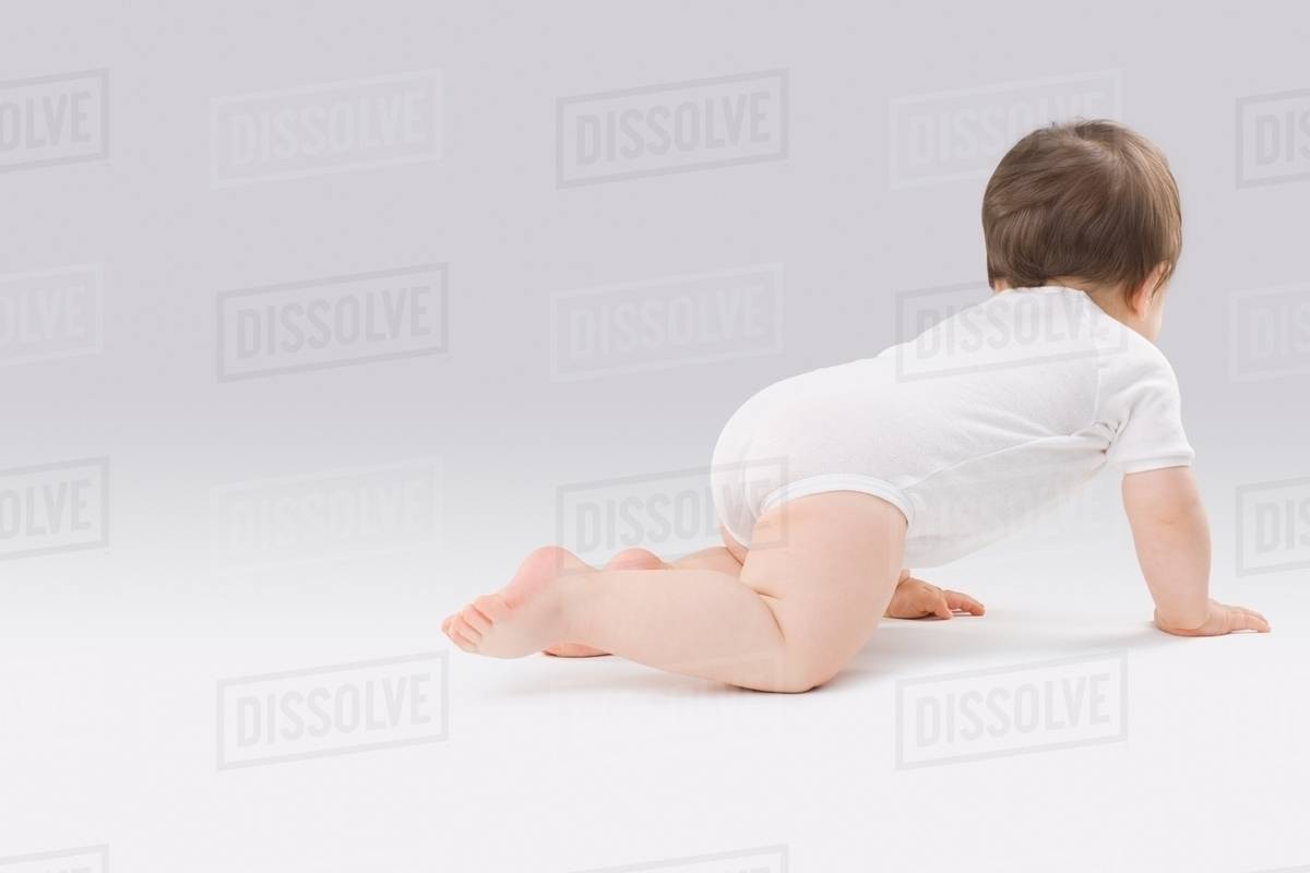 Baby crawling - Royalty-free Stock Photo | Dissolve