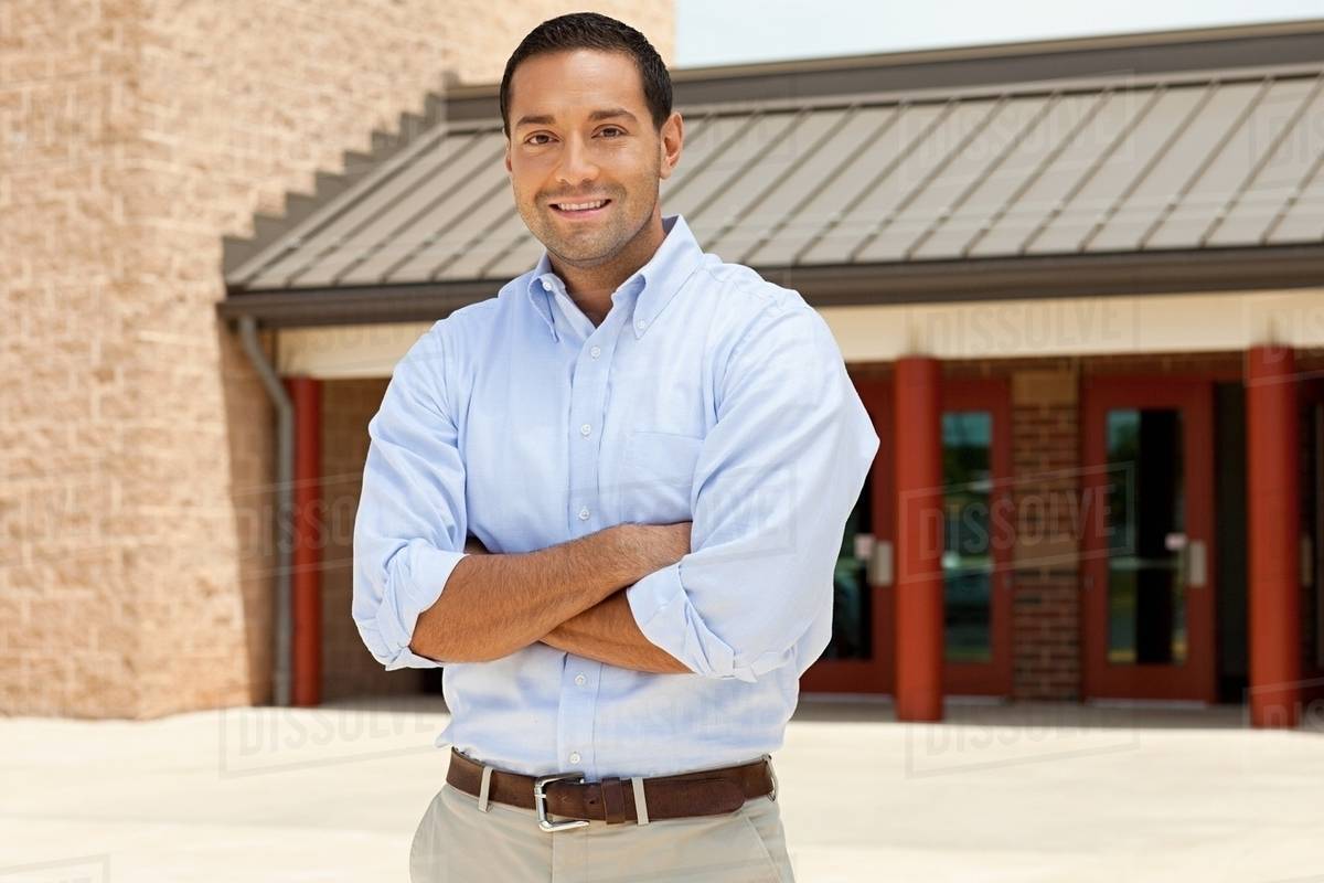 Portrait of male high school teacher - Royalty-free Stock Photo | Dissolve