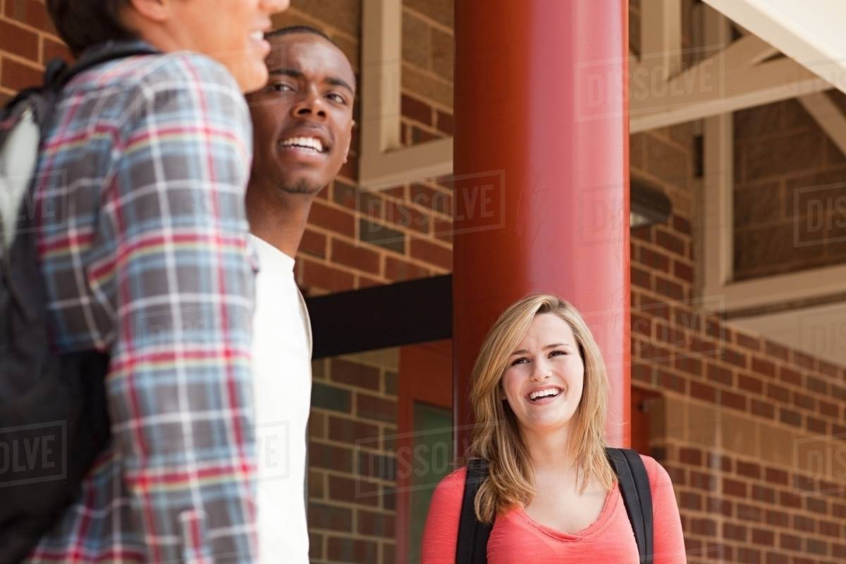 High school students outside school building - Royalty-free Stock Photo ...