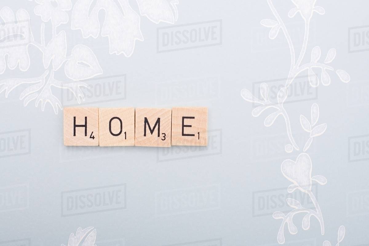 Game tile letters spelling home - Royalty-free Stock Photo | Dissolve