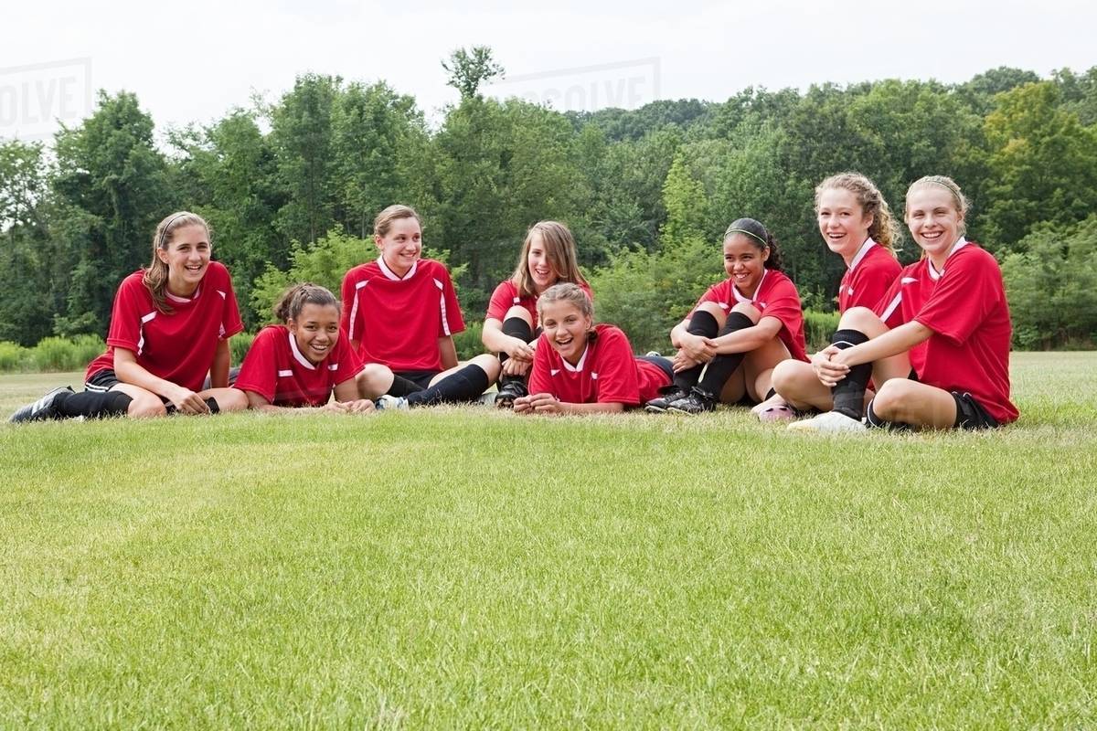 Girl soccer players on field - Royalty-free Stock Photo | Dissolve