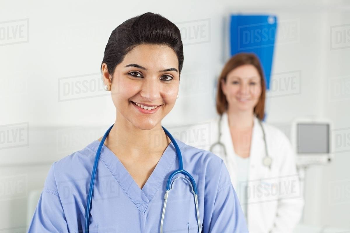 Portrait of two female doctors - Royalty-free Stock Photo | Dissolve