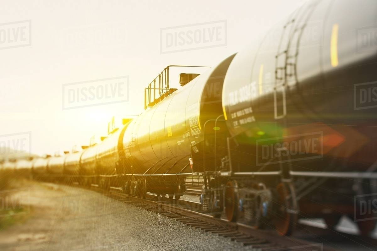 Railroad tanker cars in sunlight - Royalty-free Stock Photo | Dissolve