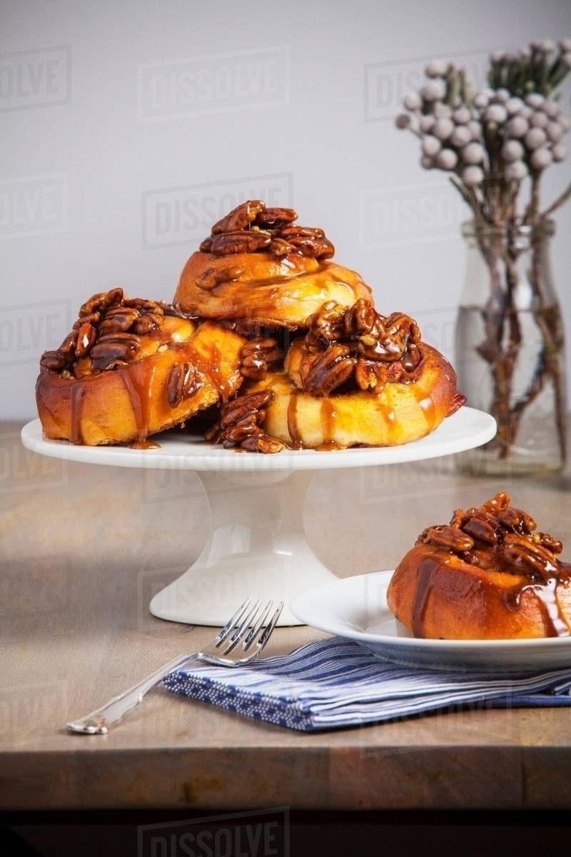Platter of sticky buns on table - Royalty-free Stock Photo | Dissolve