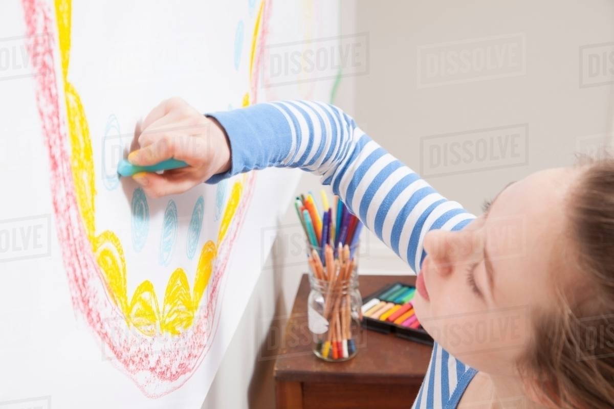 Girl drawing on wall - Stock Photo - Dissolve