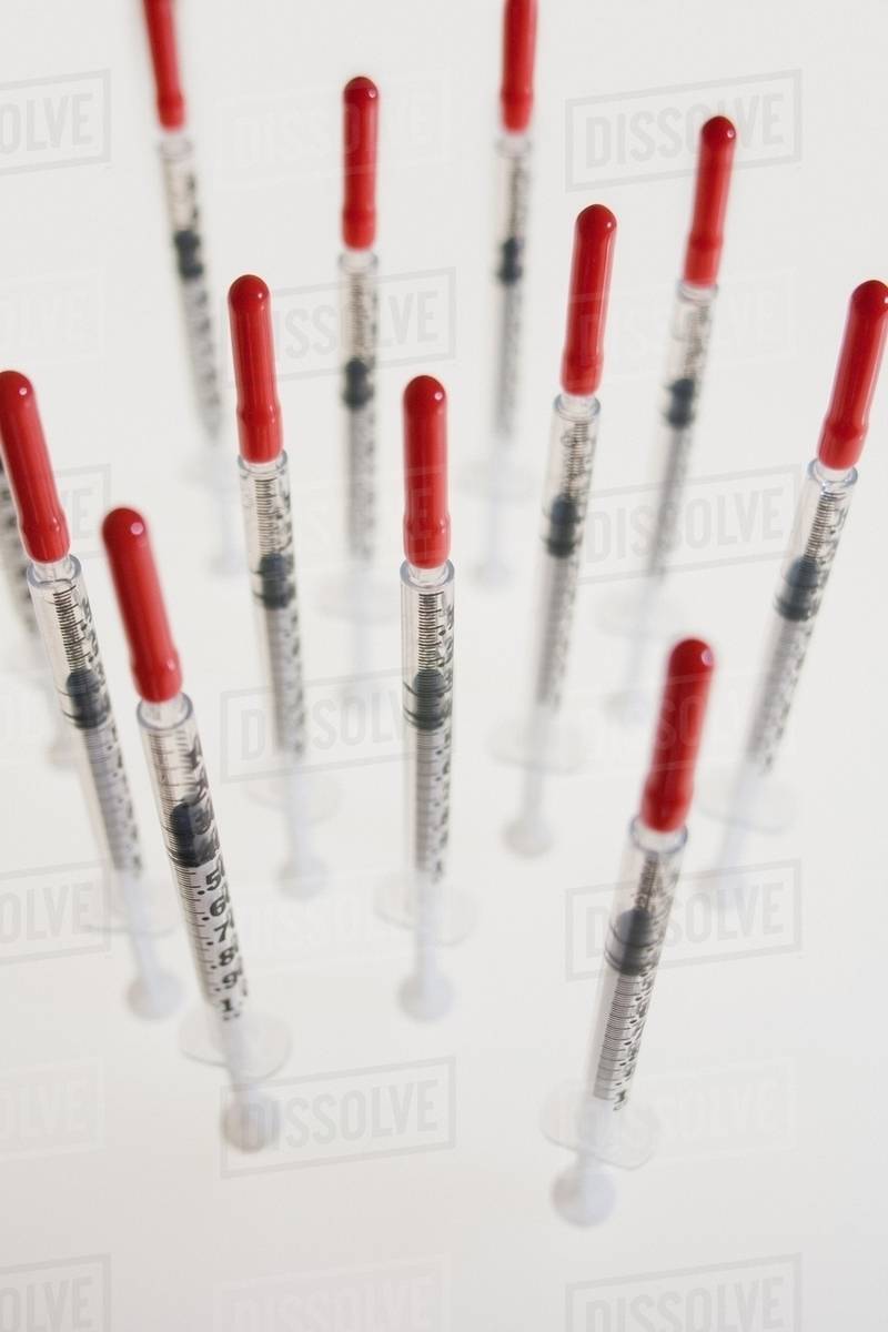 Syringes in upright position - Royalty-free Stock Photo | Dissolve