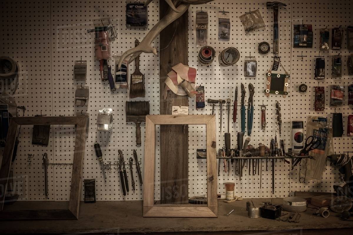Tools hanging in artist's workshop - Royalty-free Stock Photo | Dissolve