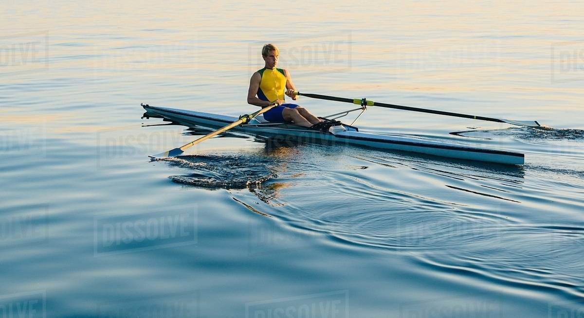 Teenage boy, sculling - Royalty-free Stock Photo | Dissolve