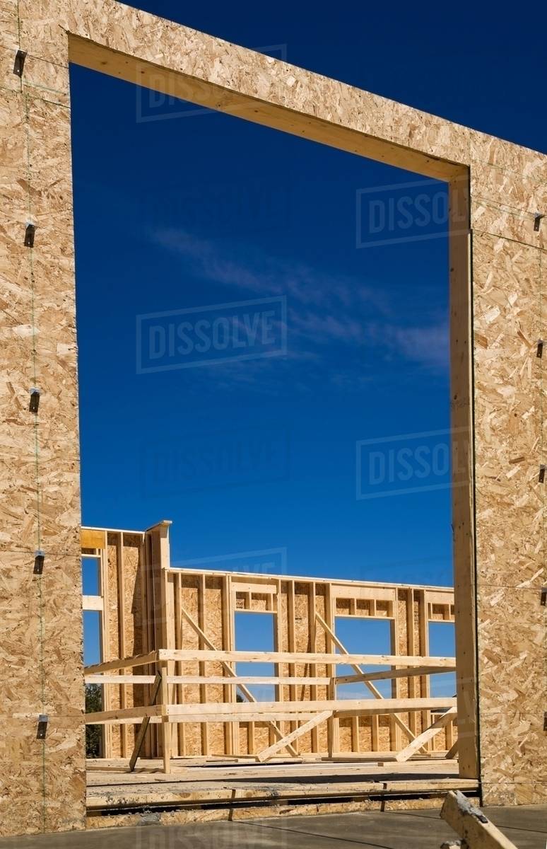 Exterior and interior walls of residential cottage style home under ...