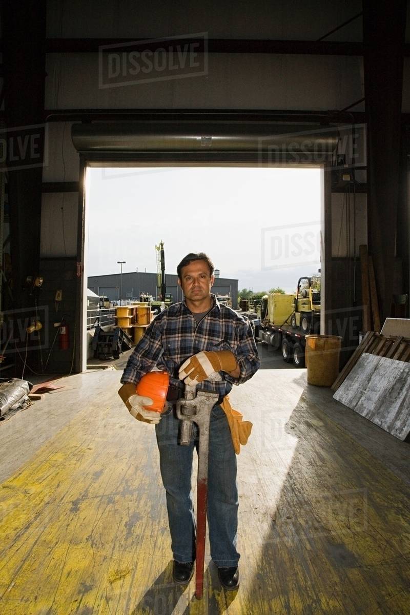 Worker in warehouse - Stock Photo - Dissolve