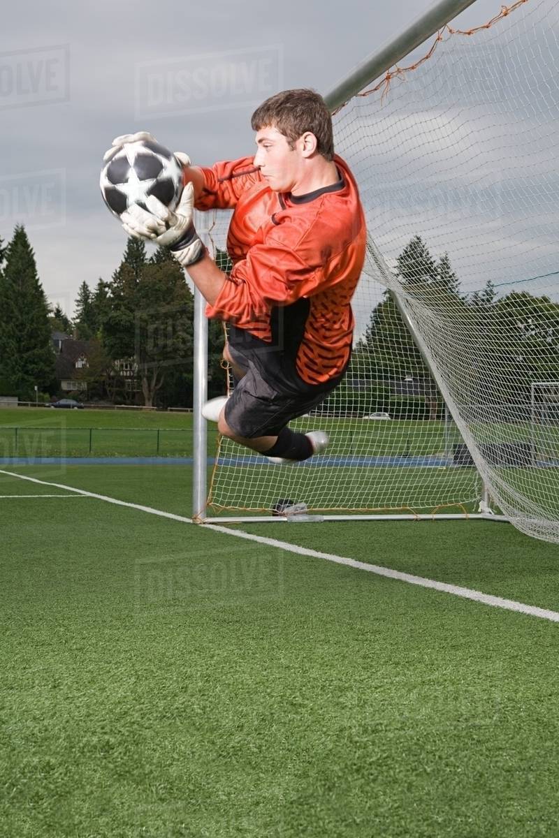 Goalkeeper making a save - Royalty-free Stock Photo | Dissolve