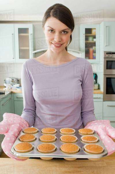 Woman baking cakes - Royalty-free Stock Photo | Dissolve