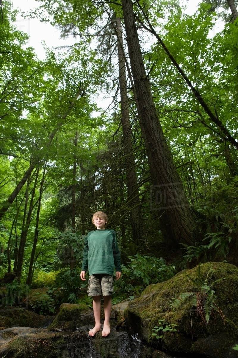 Boy in forest - Royalty-free Stock Photo | Dissolve