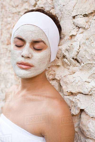 Woman wearing face mask - Stock Photo - Dissolve