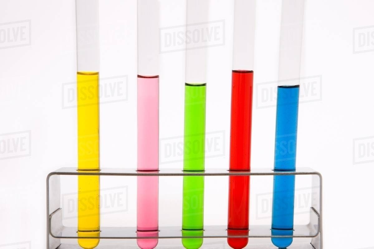 Colorful test tubes in a row - Royalty-free Stock Photo | Dissolve
