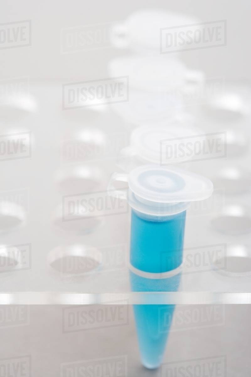 Blue liquid in a plastic test tube - Royalty-free Stock Photo | Dissolve