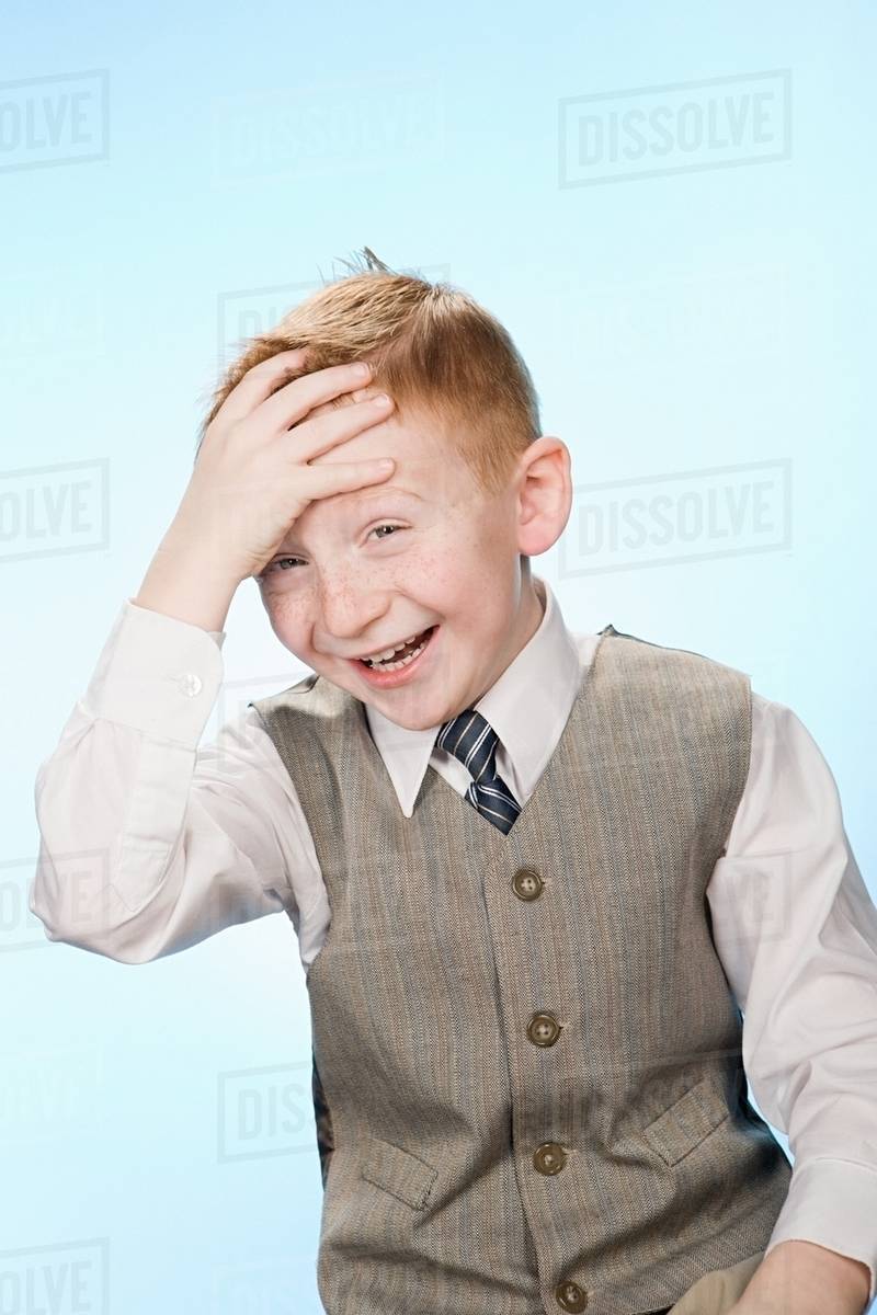Portrait of a boy laughing - Stock Photo - Dissolve