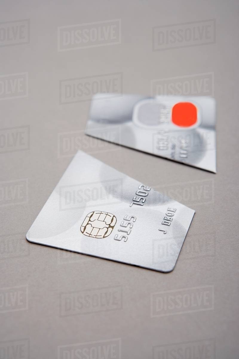 Credit card cut in half - Royalty-free Stock Photo | Dissolve