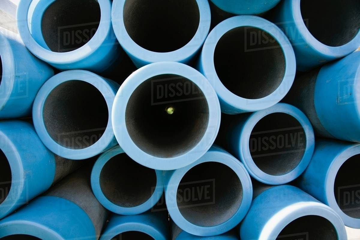 Close up of pipes at construction site - Stock Photo - Dissolve